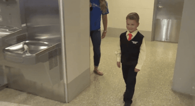 Little boy lives dream as flight attendant on his Make-A-Wish trip to ...